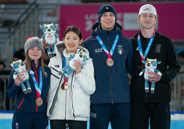 Bronze for speed skater + Luca Harrington named Closing Ceremony ...